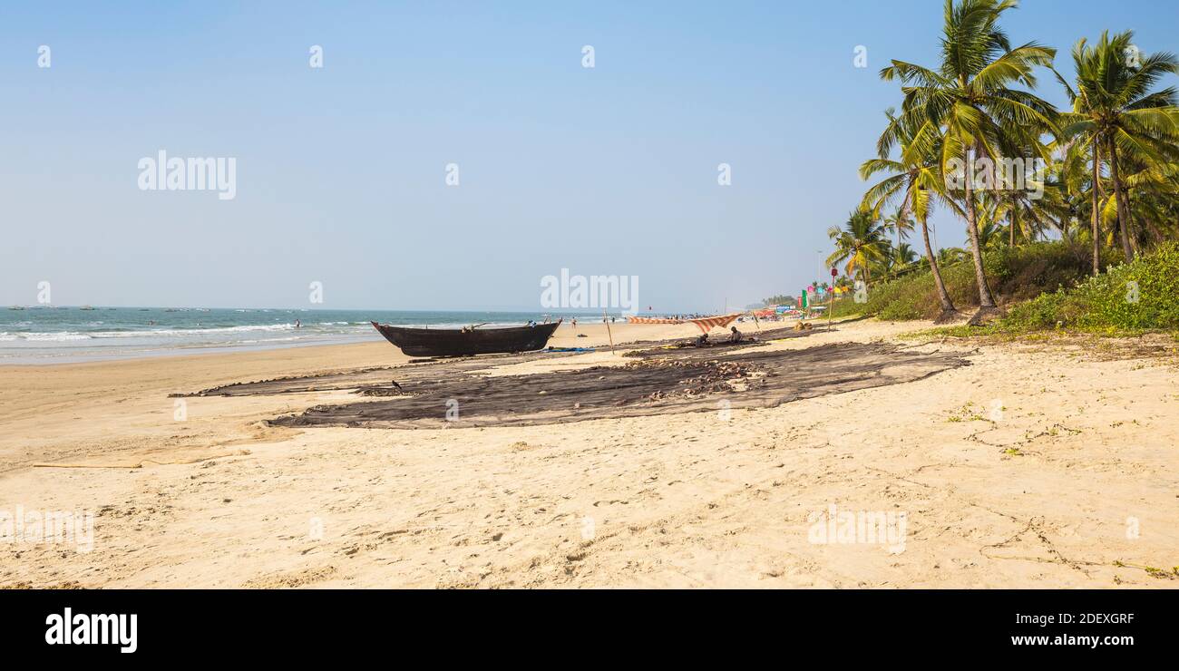 India, Goa, Fishing boat and nets on Colva beach Stock Photo - Alamy