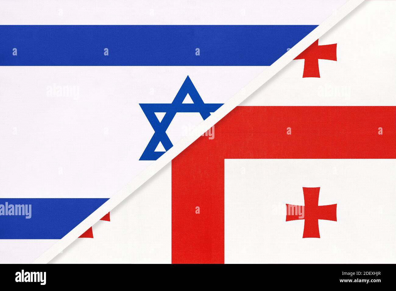 Israel and Georgia, national flags from textile. Relationship ...