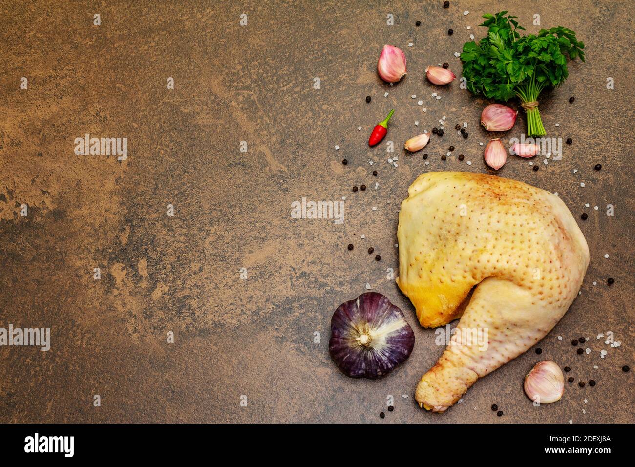 Clean food concept. Parts of organic chicken (leg) with yellowish skin ...