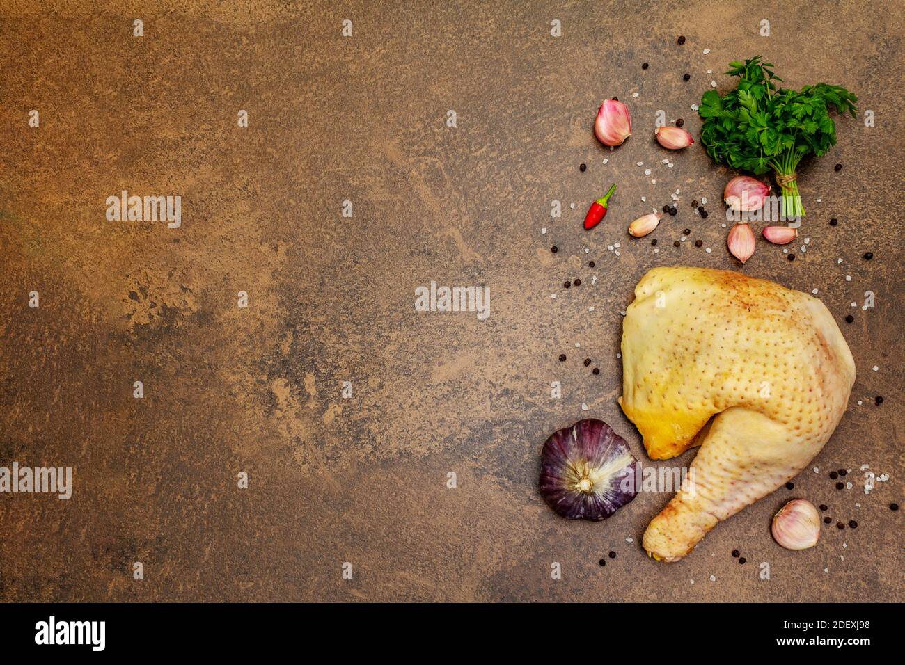 Clean food concept. Parts of organic chicken (leg) with yellowish skin ...