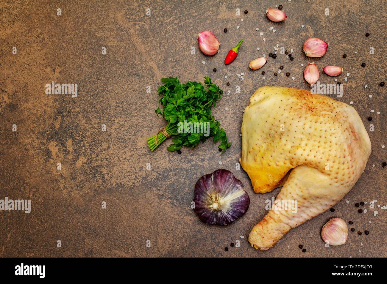 Clean food concept. Parts of organic chicken (leg) with yellowish skin ...
