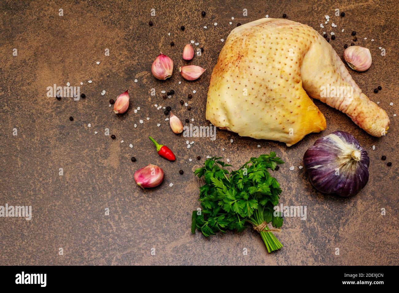 Clean food concept. Parts of organic chicken (leg) with yellowish skin ...
