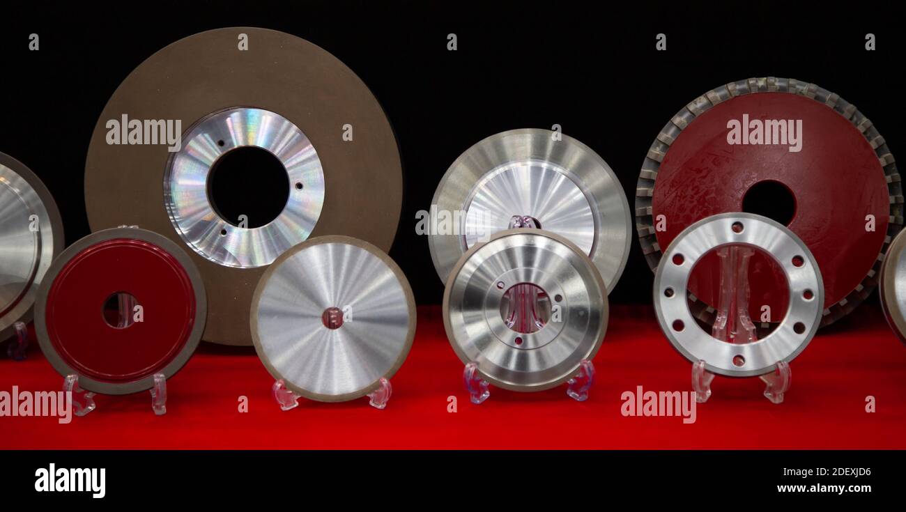 Variety of diamond disc display on table. Industrial construction tool ...