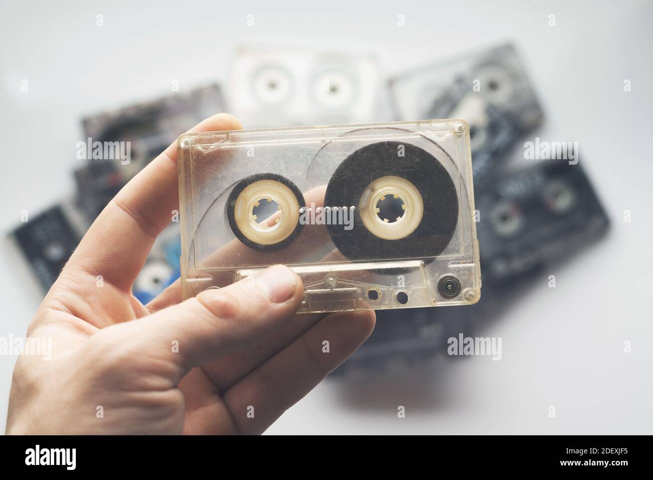 Hand holds the cassette. Retro tape cassette music. Old music Stock ...