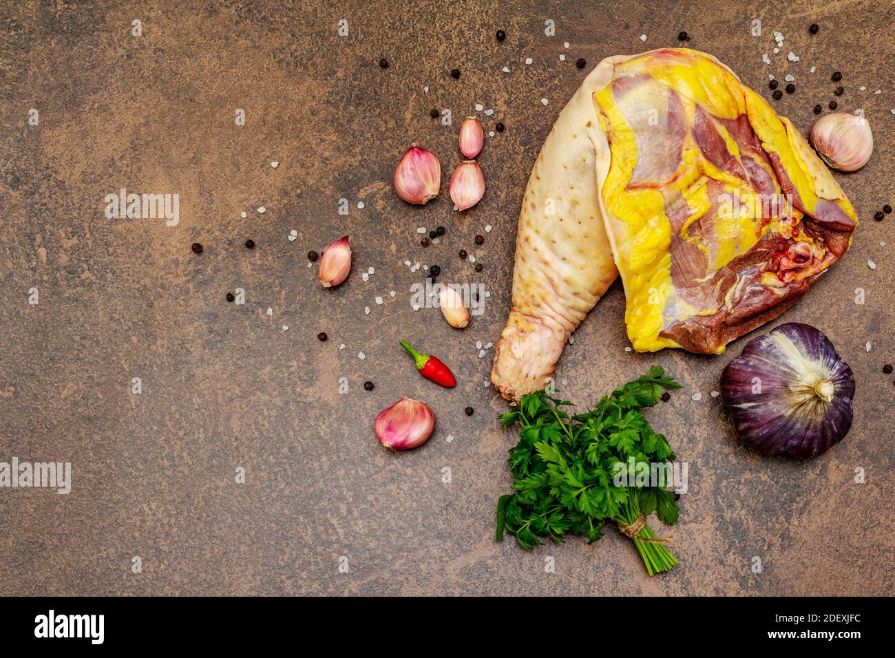 Clean food concept. Parts of organic chicken (leg) with yellowish skin ...