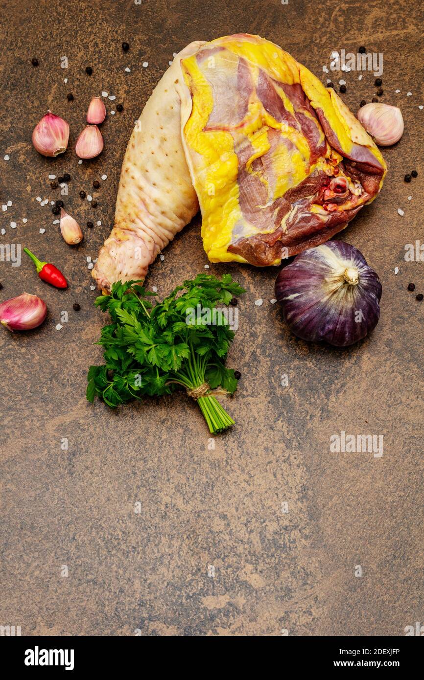 Clean food concept. Parts of organic chicken (leg) with yellowish skin ...