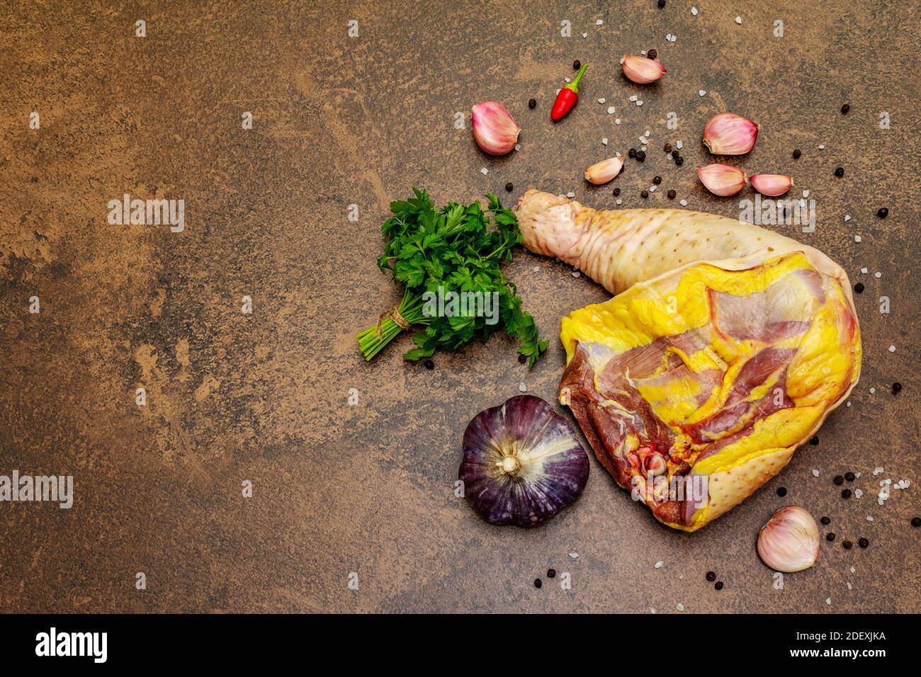 Clean food concept. Parts of organic chicken (leg) with yellowish skin ...
