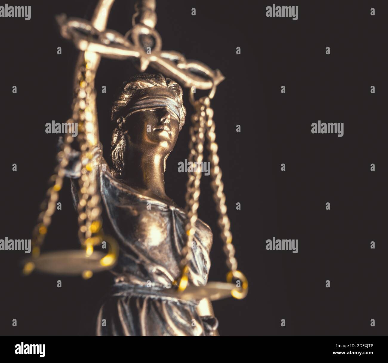 Statue of lady justice on bright background - Side view with copy space ...
