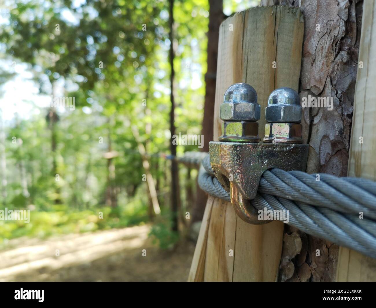 steel cable with clamps around shaft safety Stock Photo - Alamy
