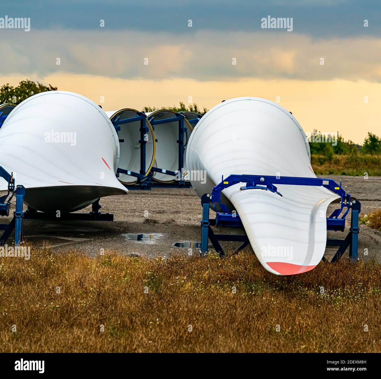 Wind turbine wings on the ground ready for export to new customers ...