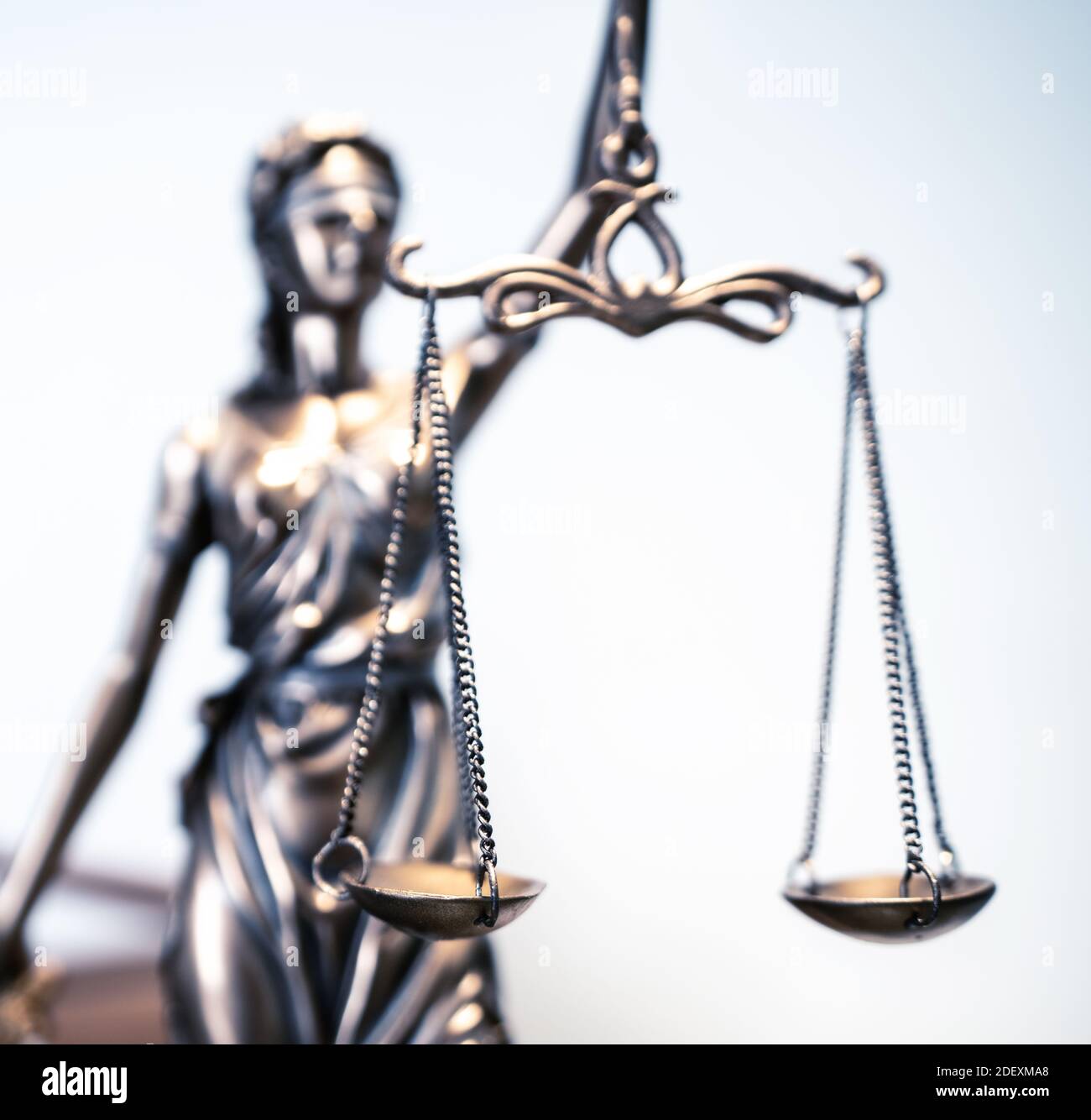 Statue of lady justice on bright background - Side view with copy space ...