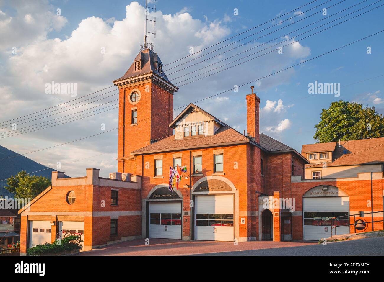 Evening light shines on the historic Nelson Fire Hall, in Nelson ...