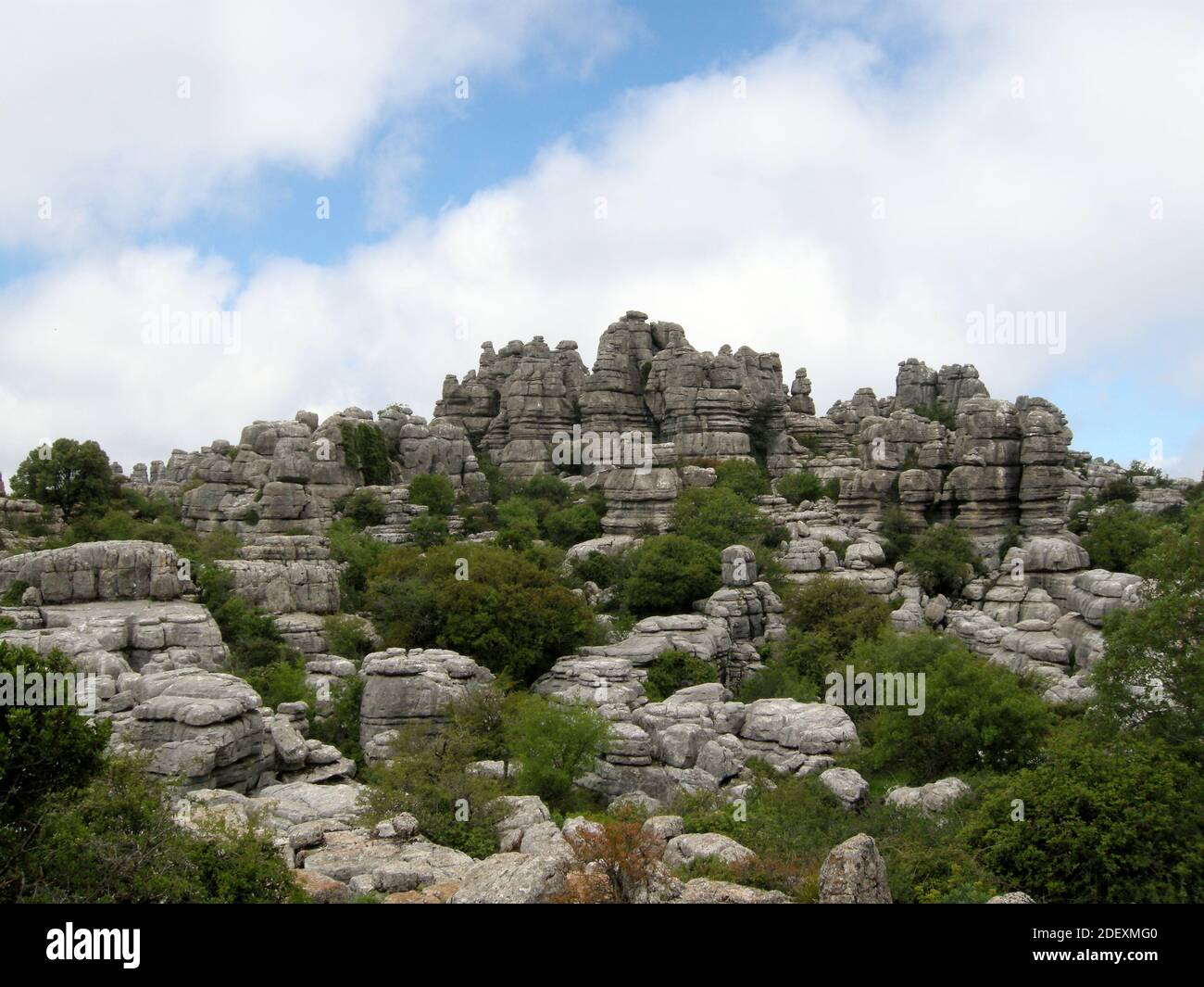 Prehistoric landscape with rocks and trees in El Torcal de Antequera ...