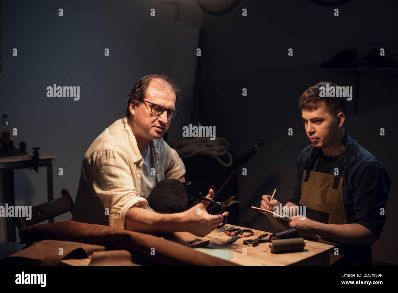 Father son hammer working workshop hi-res stock photography and images ...