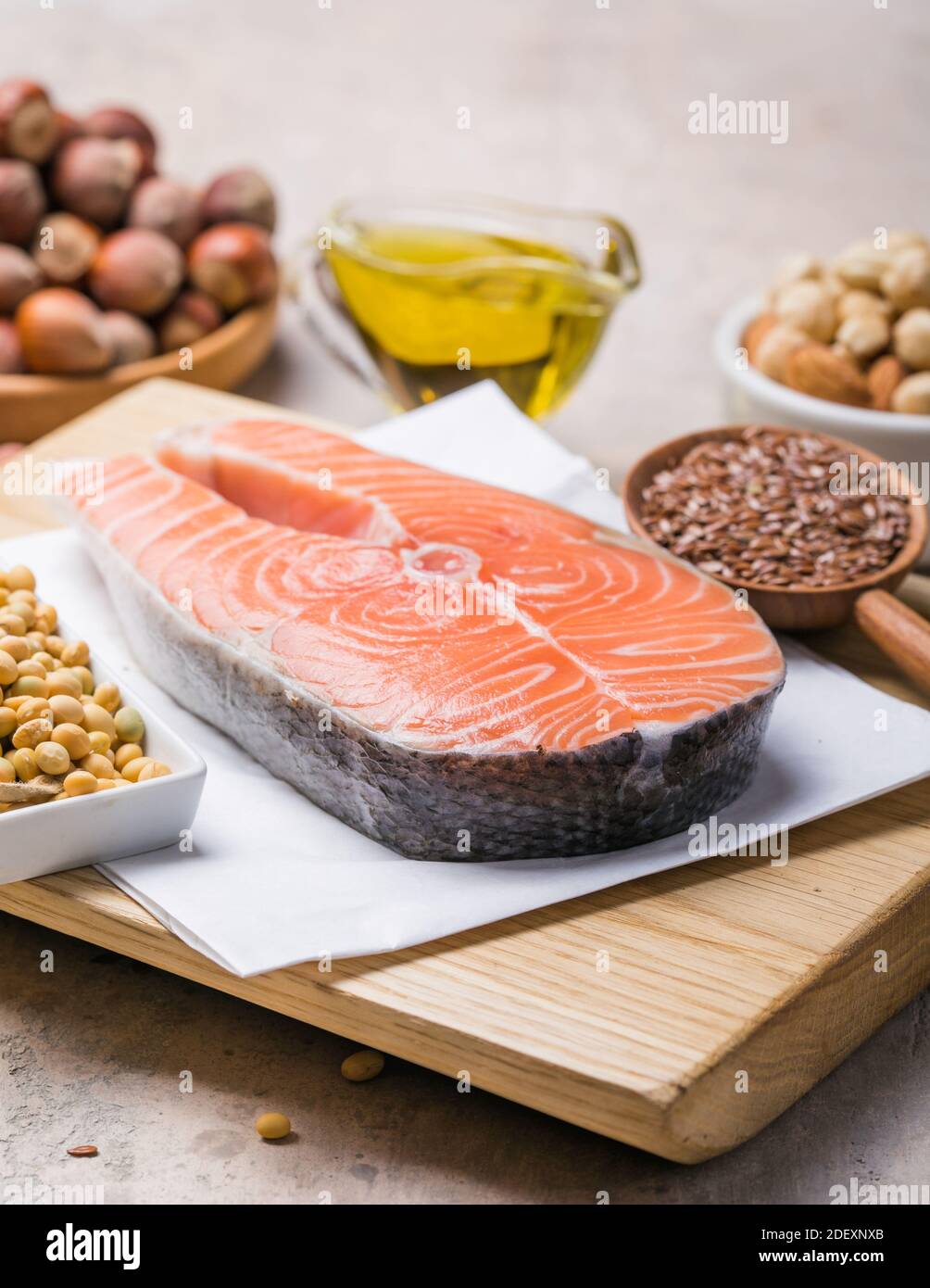 Omega 3 food sources and omega 6 on concrete background, top view copy ...