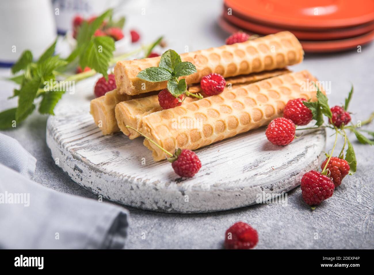 Traditional Russian dessert. Homemade wafer cones with cream of sweet ...