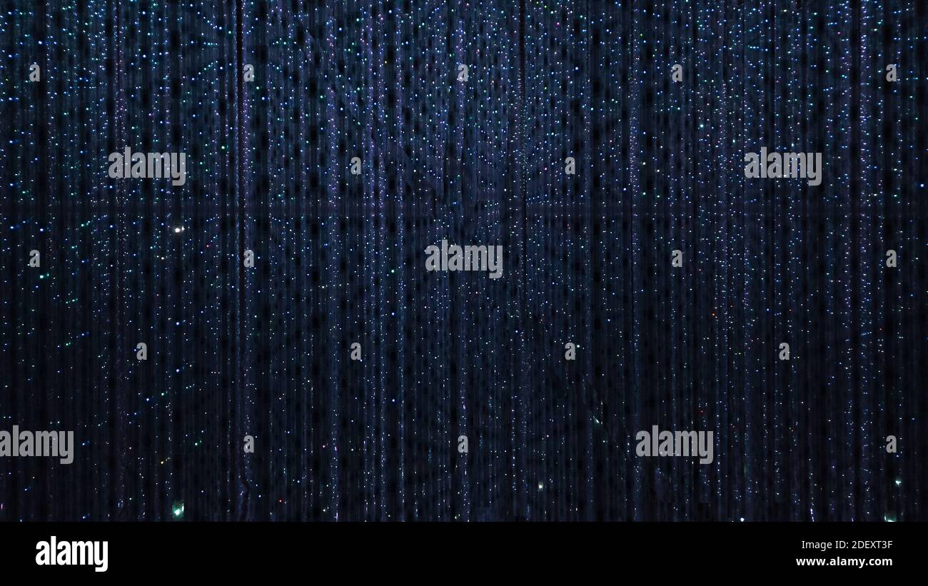 Navy blue background of spot LED flashing, blinking and flickering ...