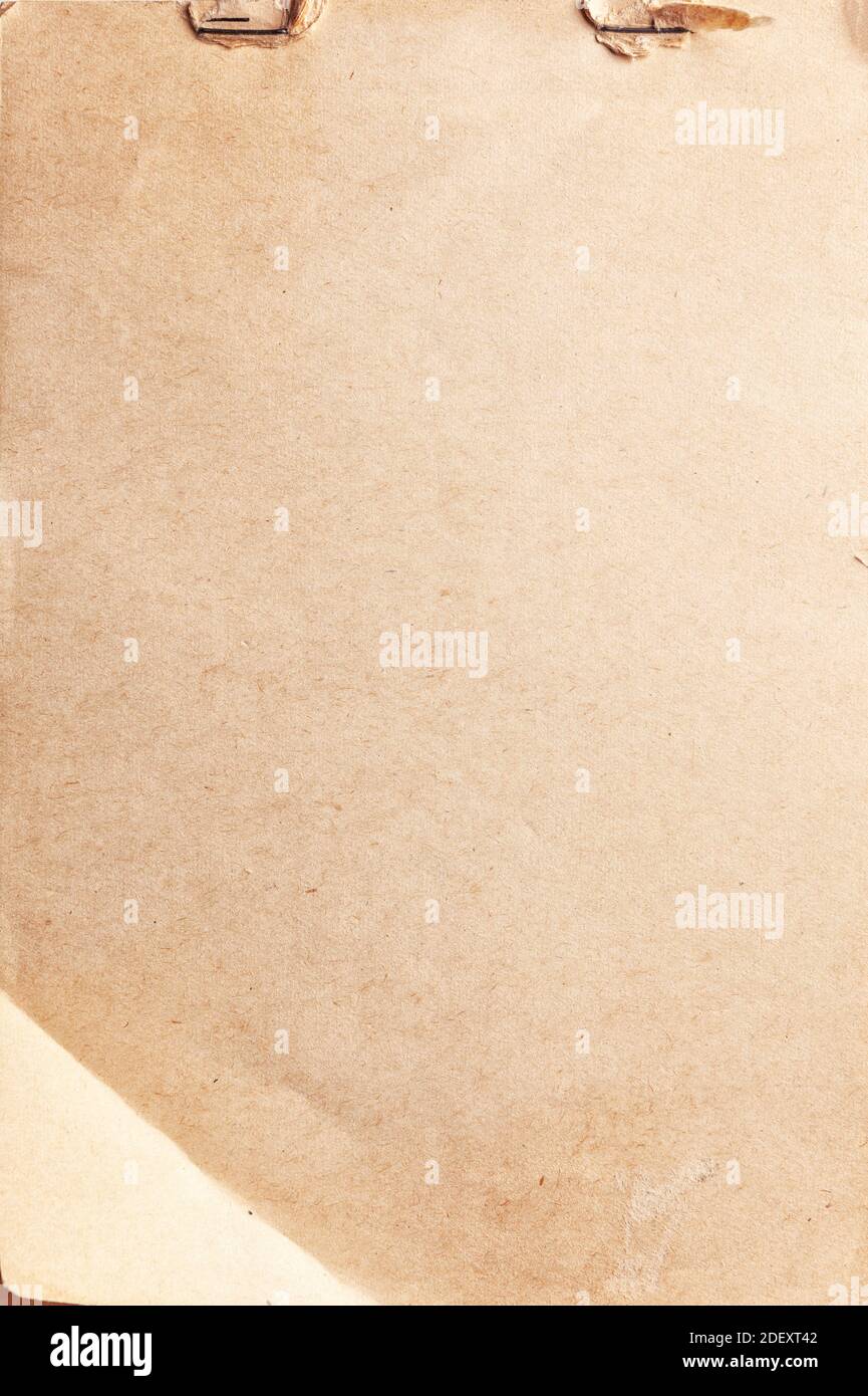 Texture of beige old paper with rust clip and folded corner, crumpled ...