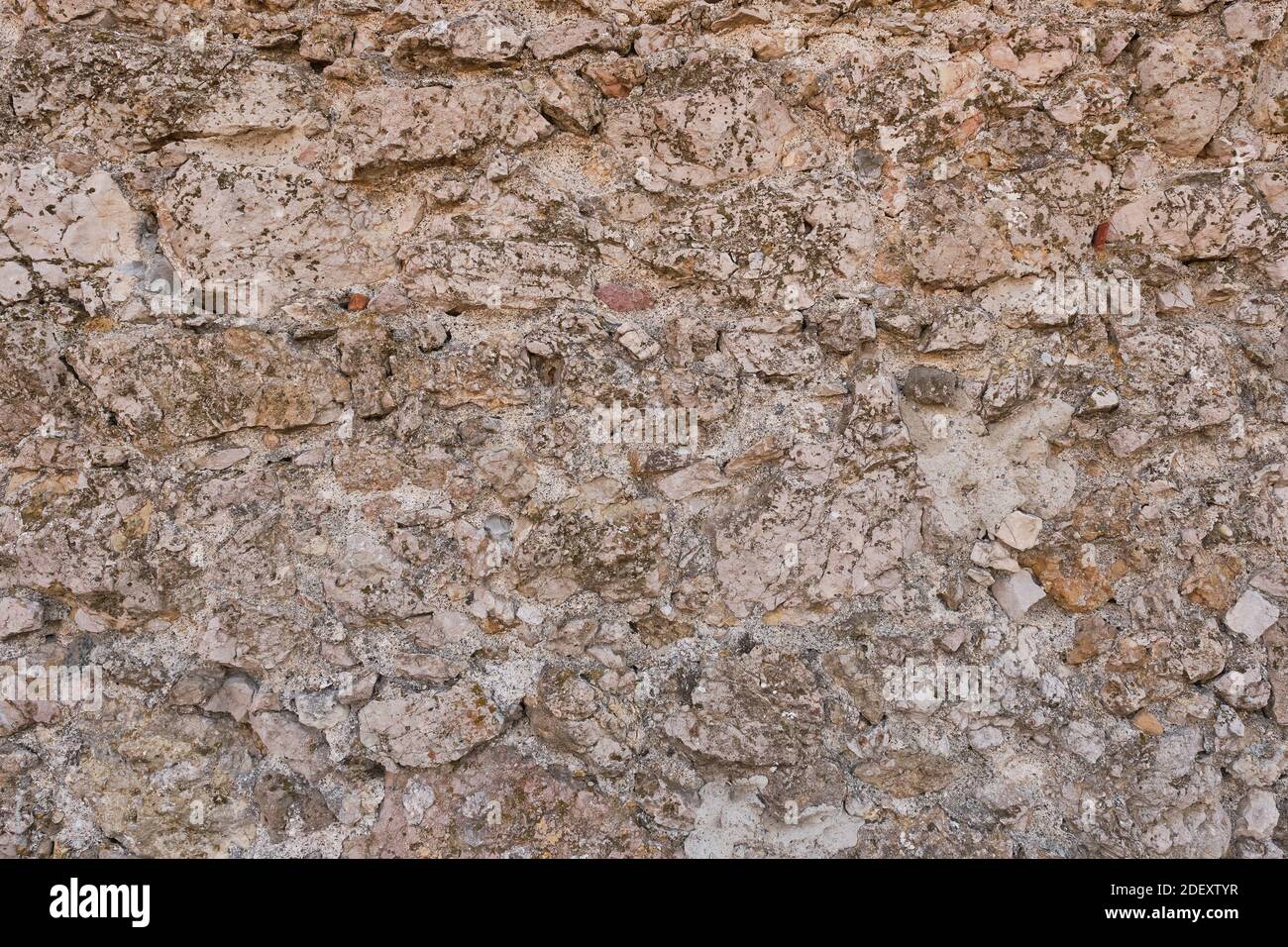 Texture of a ancient medieval stone wall as a background Stock Photo - Alamy