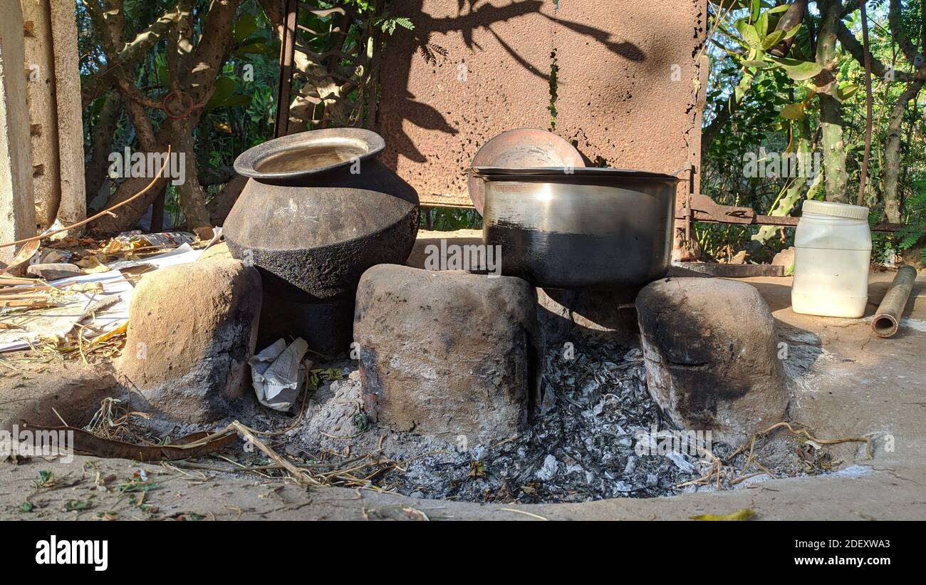 Unique food cooking on natural stove of indian rural village Stock ...