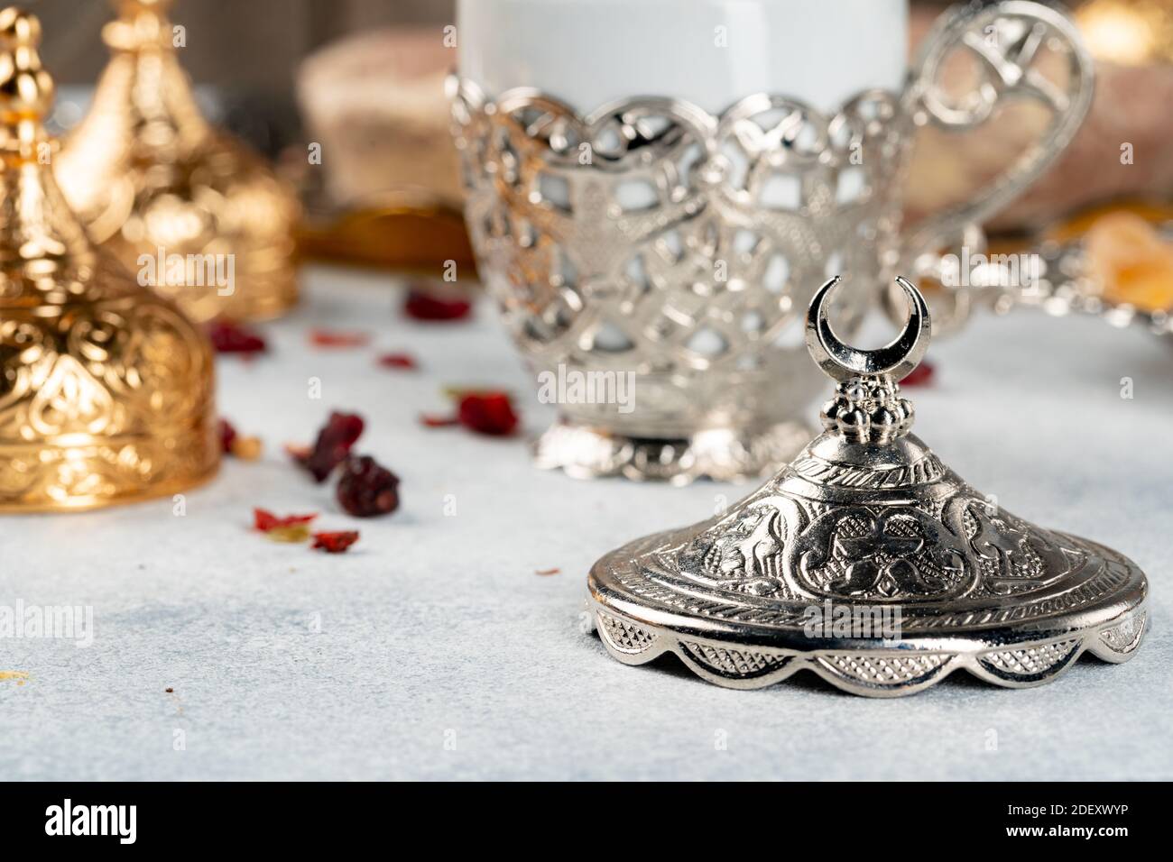 Arabic metal dishware and dry fruits on table Stock Photo - Alamy