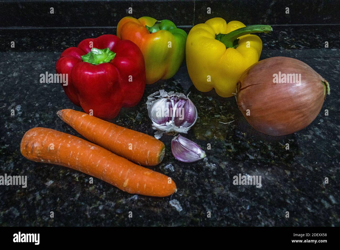 A high angle shot of different vegetables on the kitchen counter Stock ...