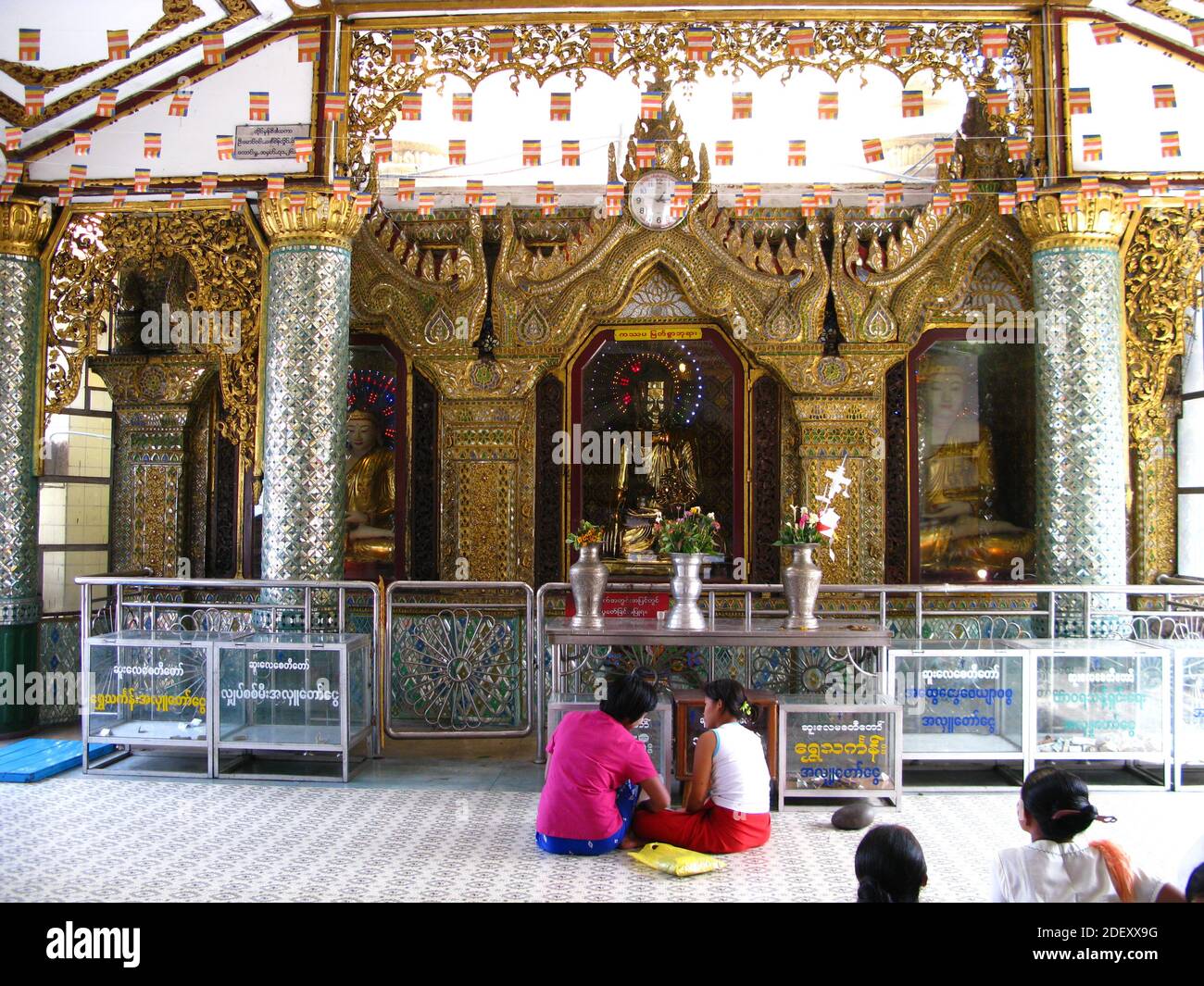 The people in the ancient temple in Yangon, Rangoon, Myanmar Stock ...