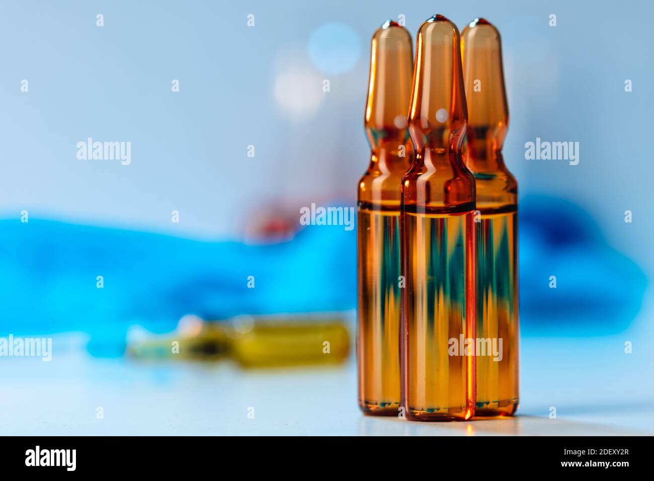 Plain ampule vials for injections close up Stock Photo - Alamy