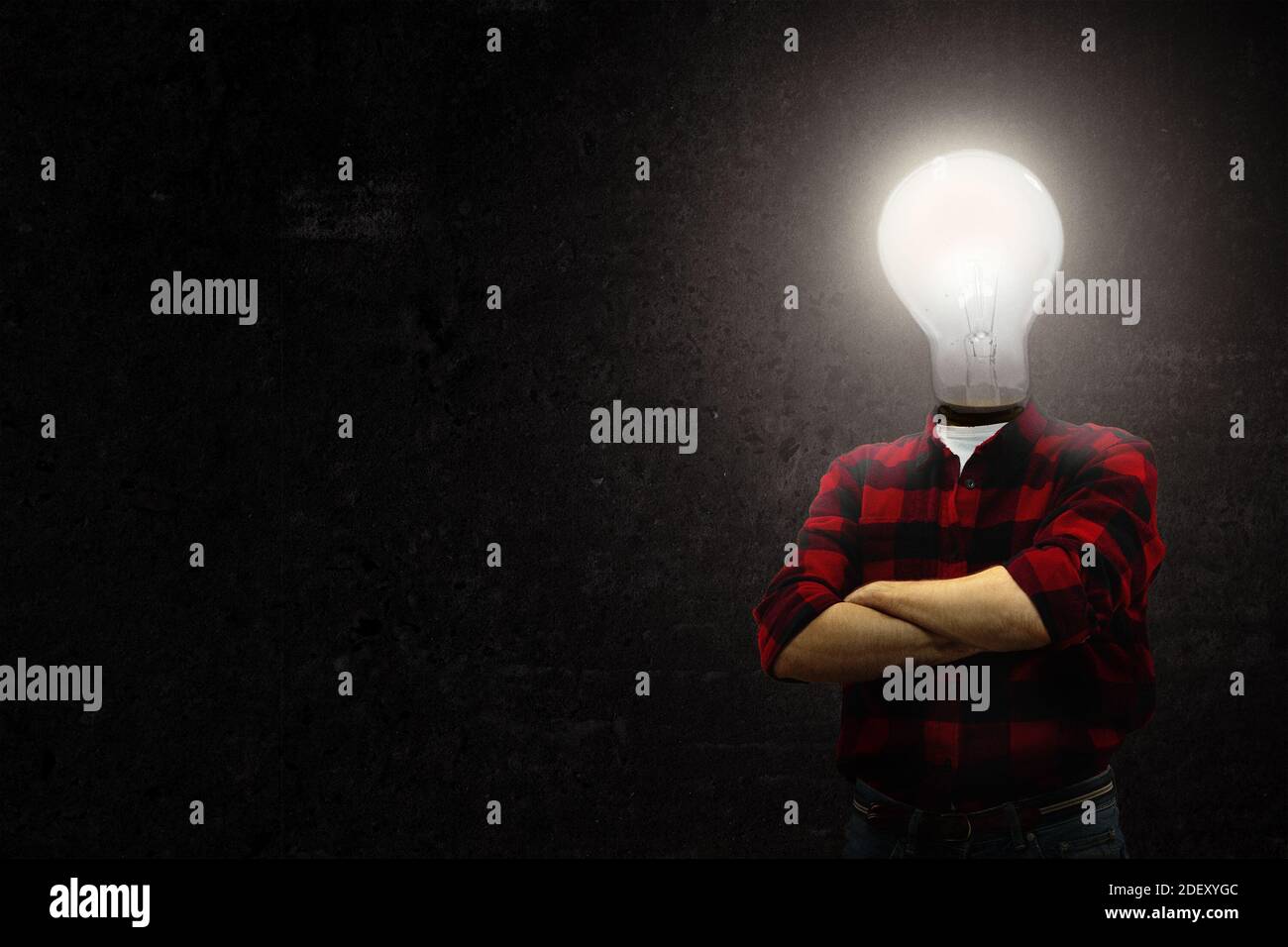 Great mentality. Male body of model with bright electric bulb instead ...