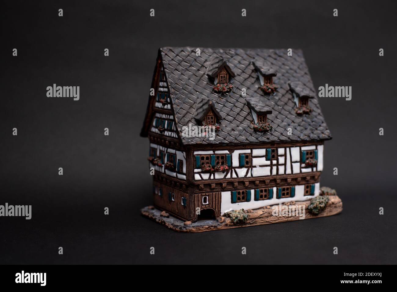 handmade ceramic house with many windows Stock Photo - Alamy