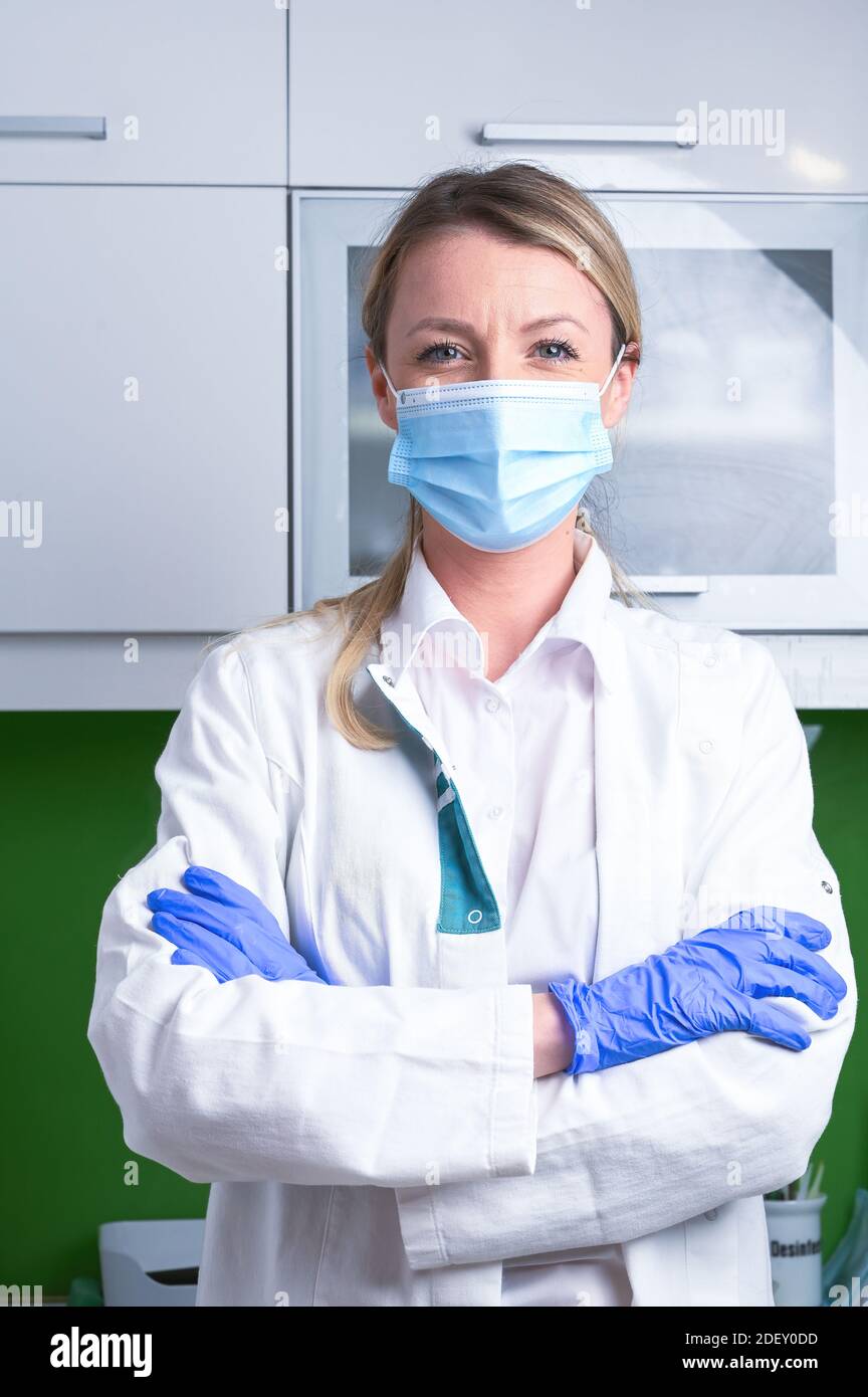 Vertical shot female doctor hi-res stock photography and images - Alamy