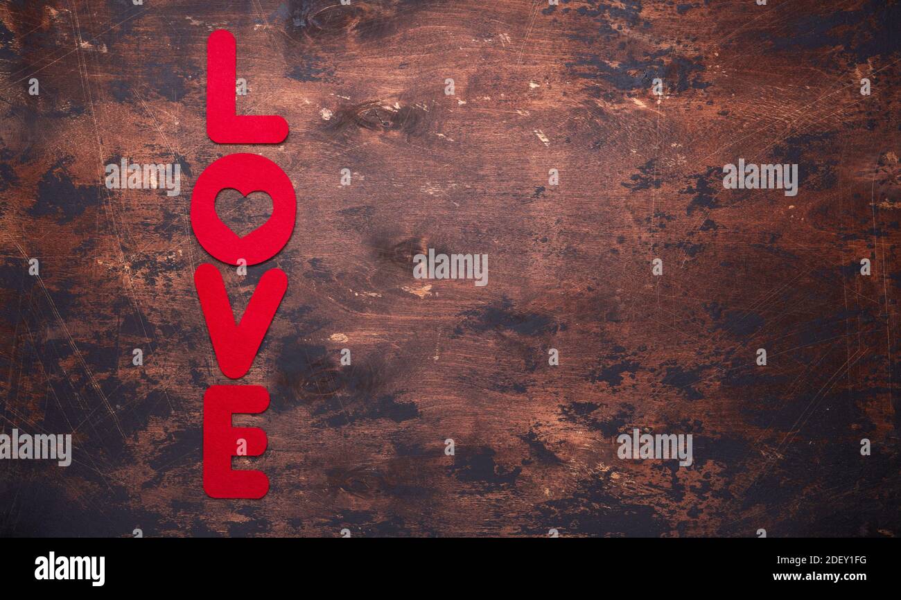 Word Love on old wooden background Red textile letters Top view Banner ...