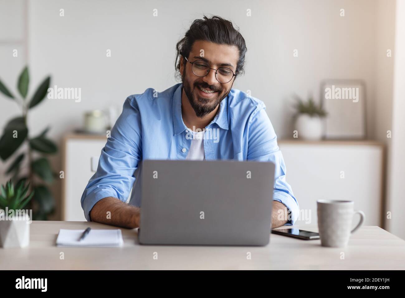 Indian male office worker hi-res stock photography and images - Alamy