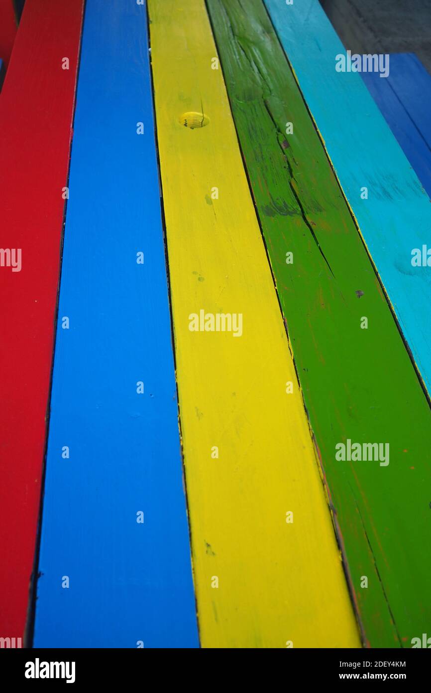 The picnic tables has several bright colors Stock Photo - Alamy