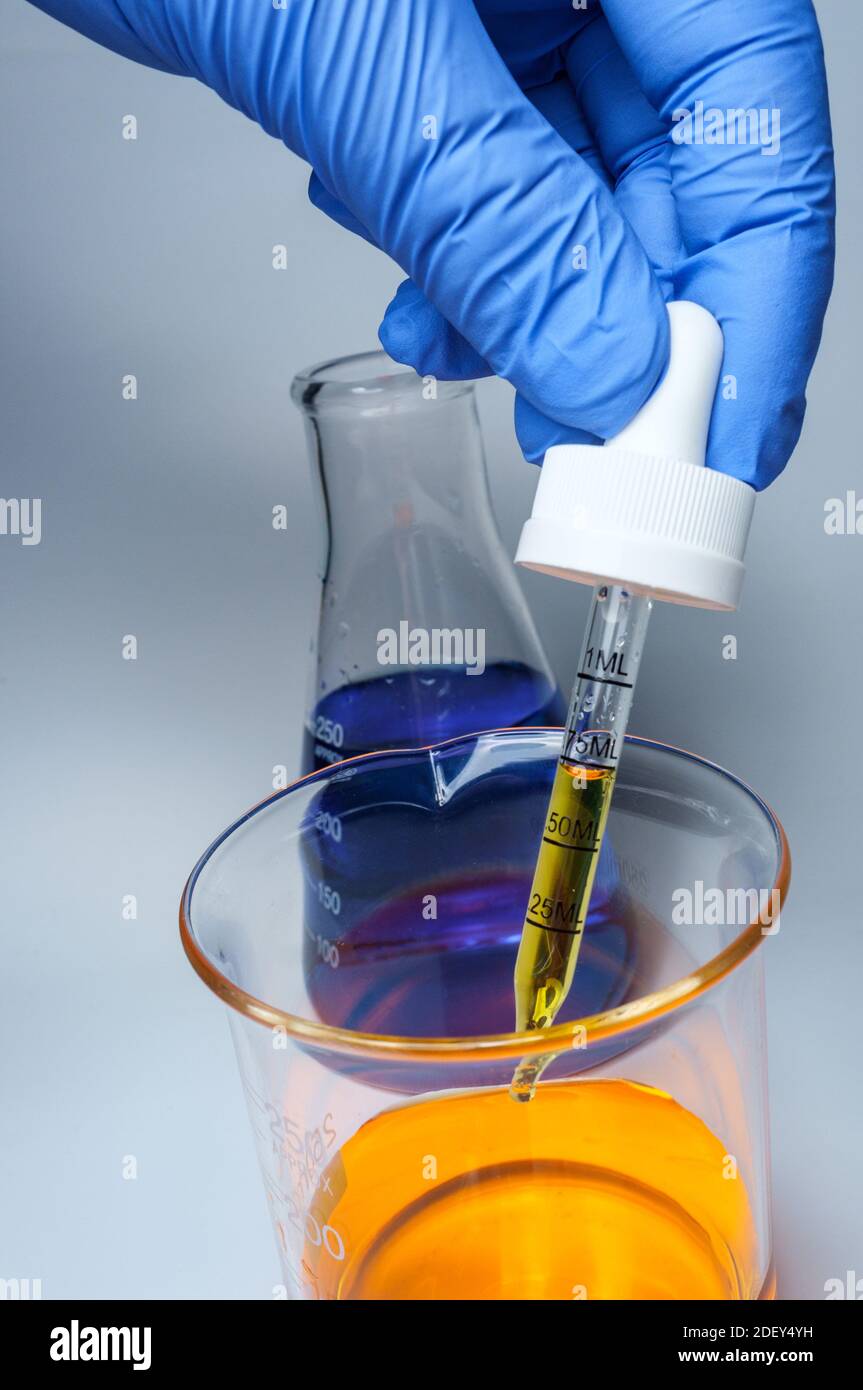 Close up glass measuring beaker for science experiment background Stock ...