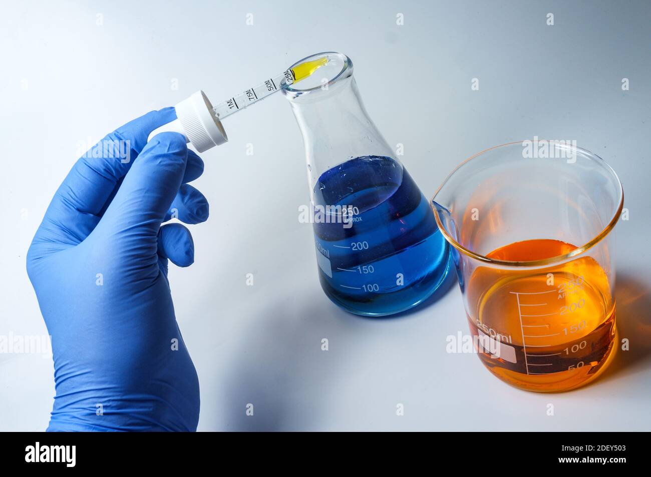 Close up glass measuring beaker for science experiment background Stock ...