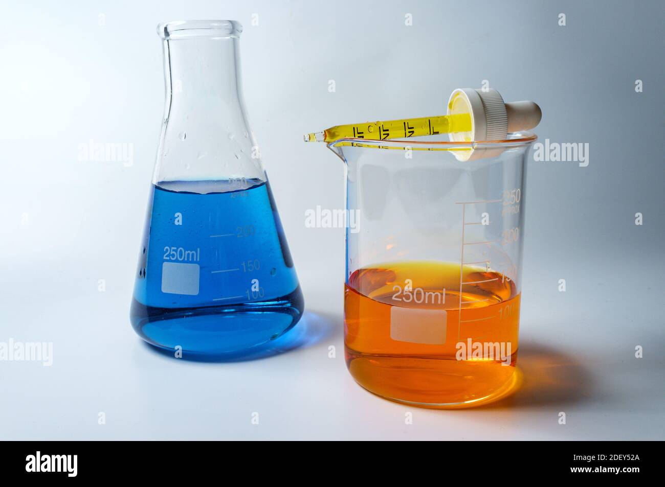 Close up glass measuring beaker for science experiment background Stock ...