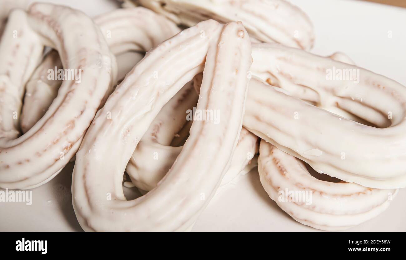 Traditional Spanish fried dough churros with delicious white chocolate ...