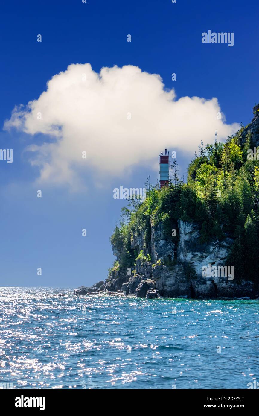 Lighthouses up the cliff for guidance to boats on Lake Huron, ON ...