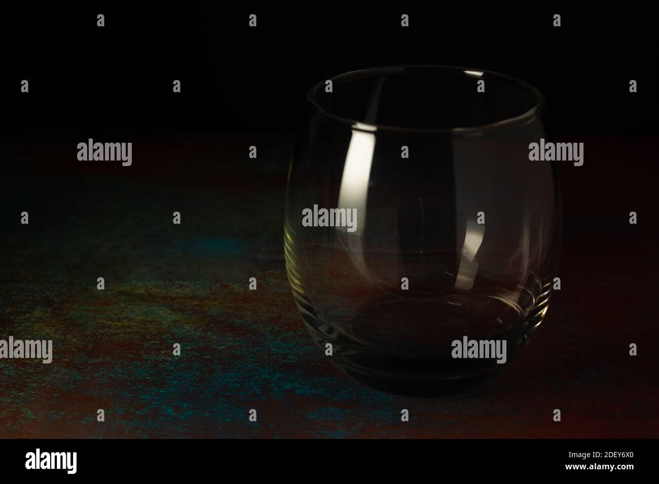 Empty glass of Water on dark background and rusty surface Stock Photo ...