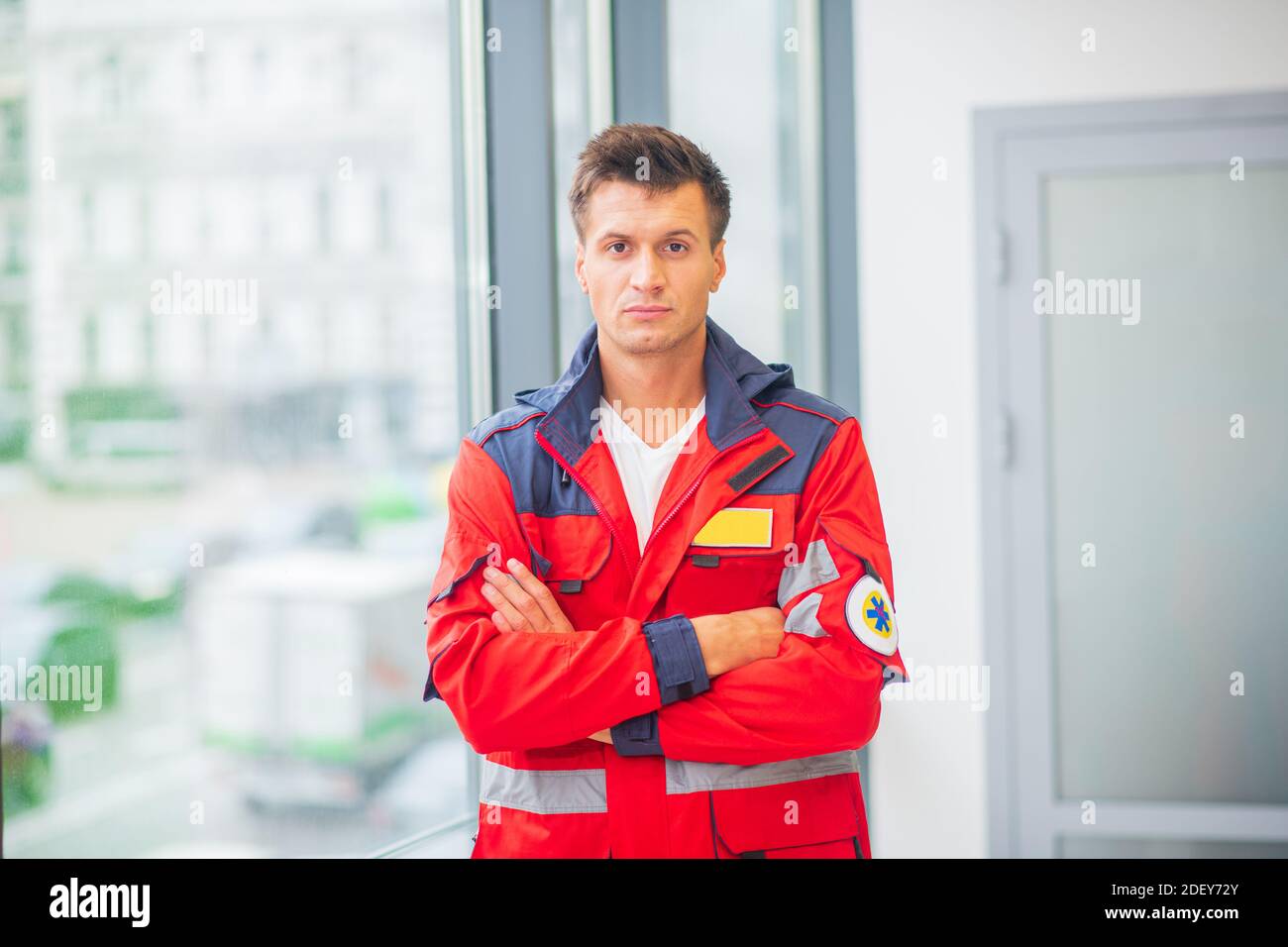 Healthcare worker in red uniform hi-res stock photography and images ...