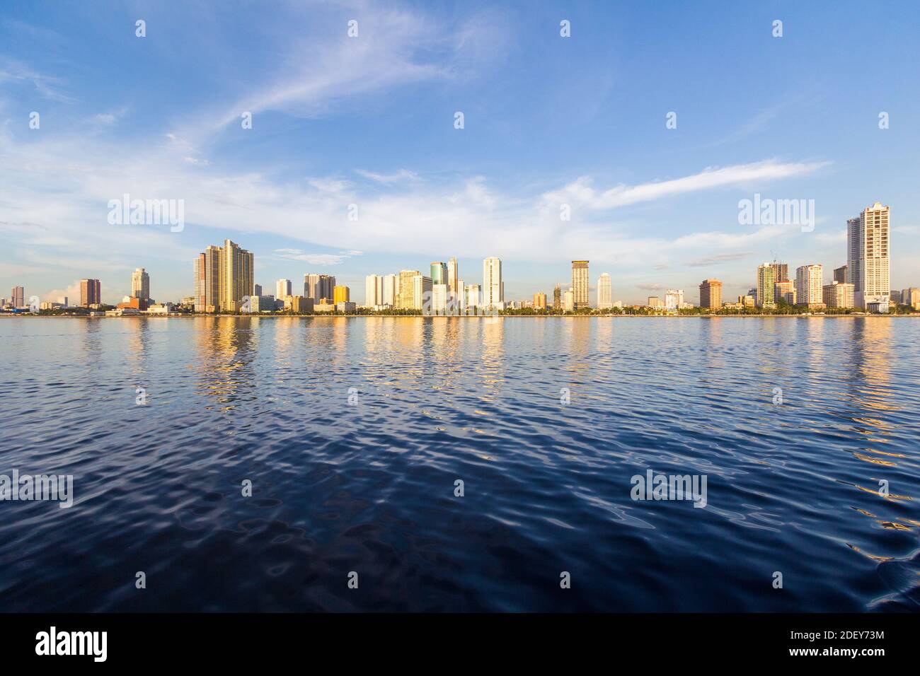 Commercial buildings in Manila as seen from Manila Bay, Philippines ...