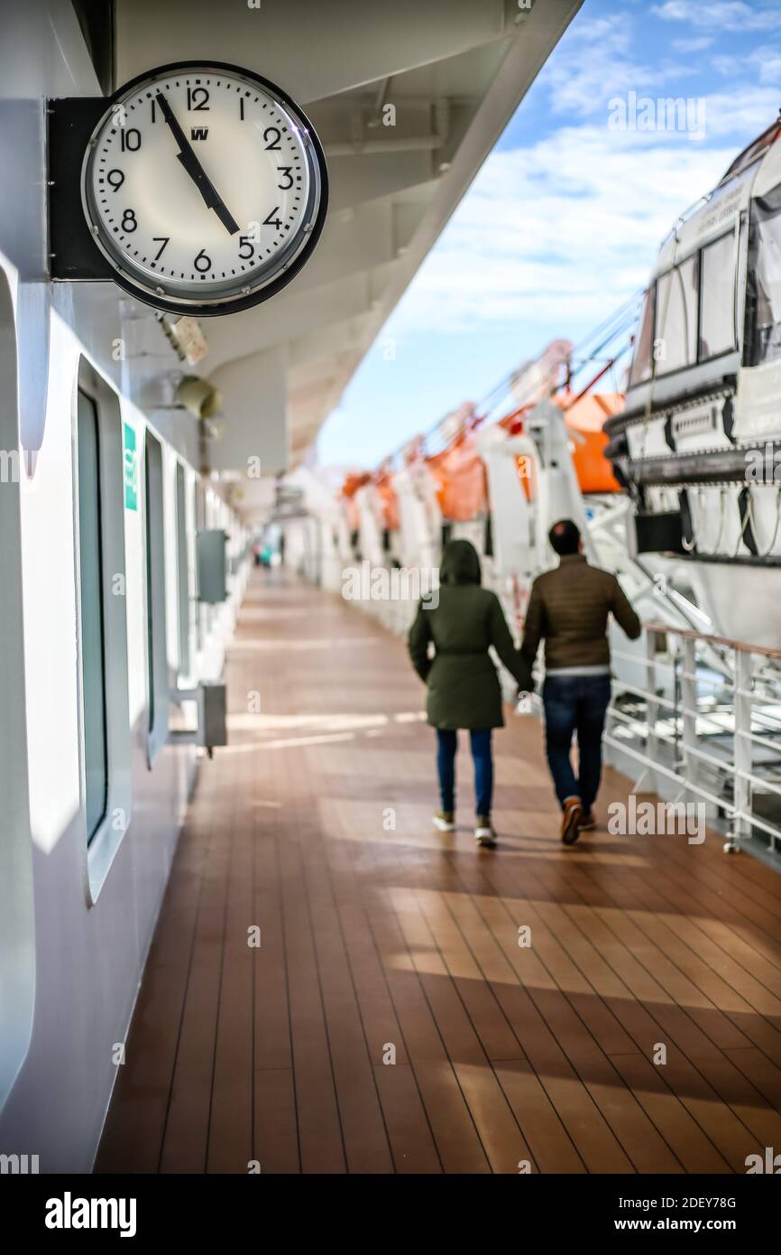 Lovely couple holding hand on cruise ships open deck Stock Photo - Alamy