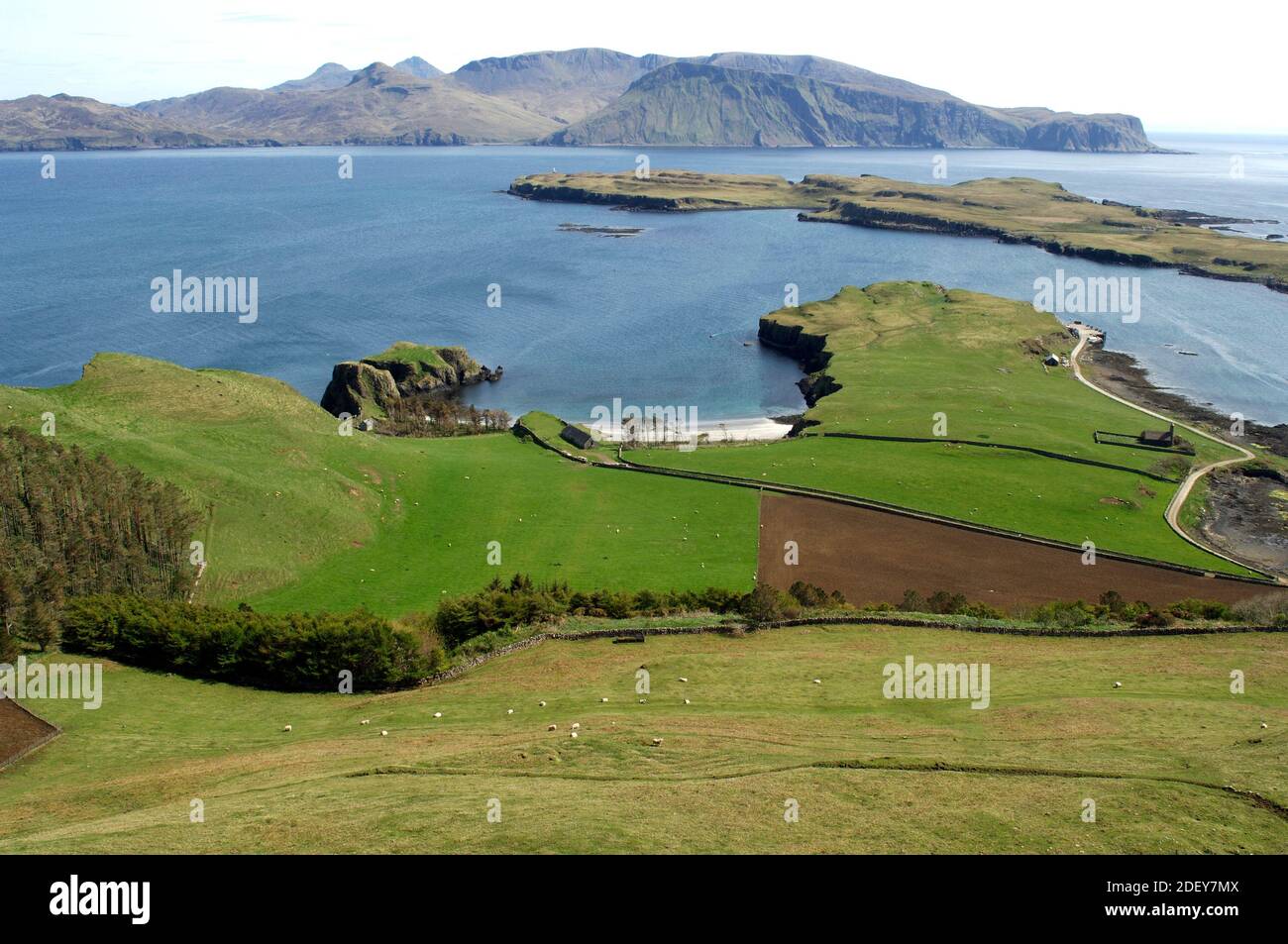 Islands of Canna (foreground) & Rhum (background). Ferry point on Canna ...