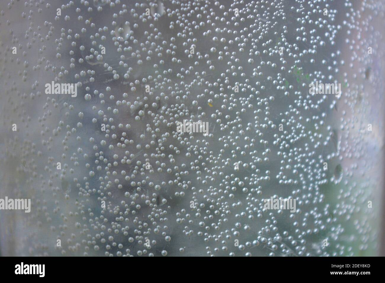 Small, round, spherical bubbles covered the surface of a plastic ...