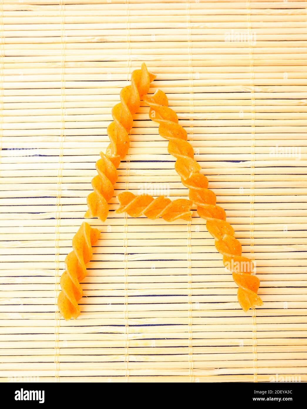 Letter A made out of pasta Stock Photo - Alamy