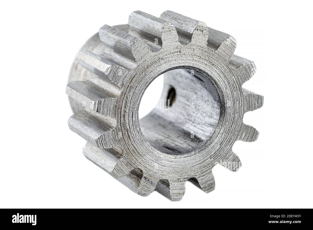 Macro shot of a steel gear with fifteen teeth, visible screw holes ...