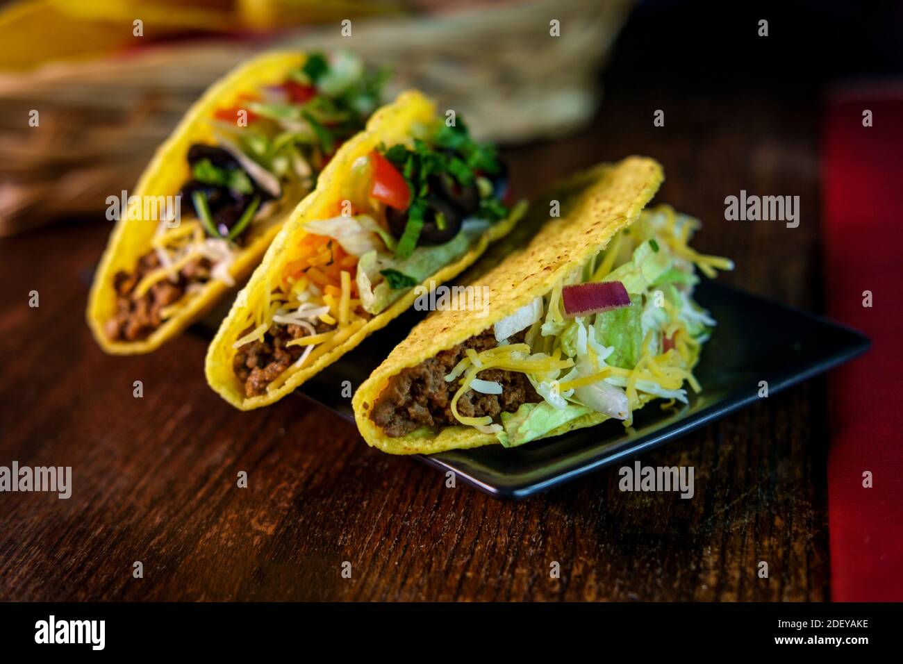 Mexican beef tacos loaded with toppings including olives shredded ...