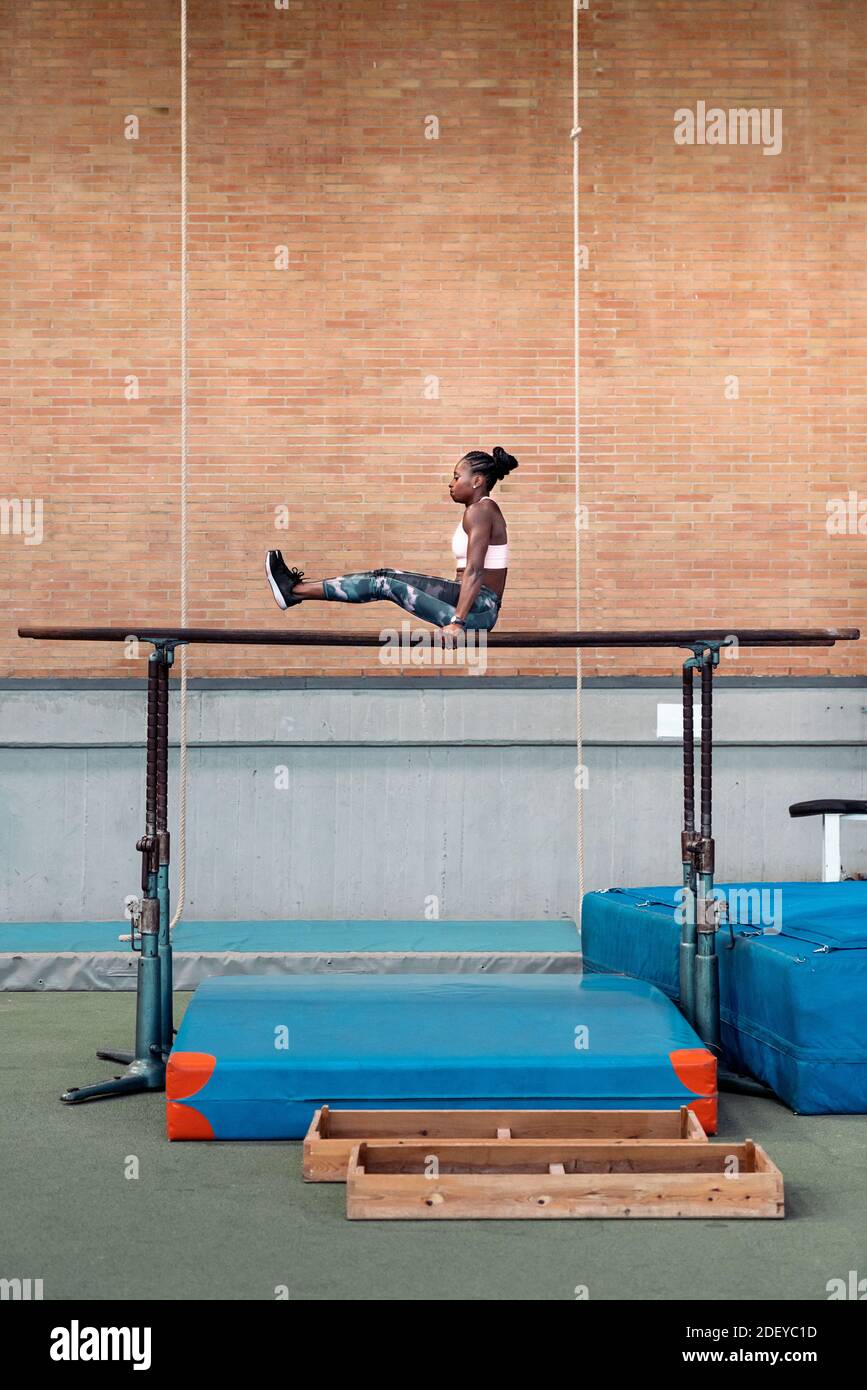 Athlete handstand on parallel bars hi-res stock photography and images ...
