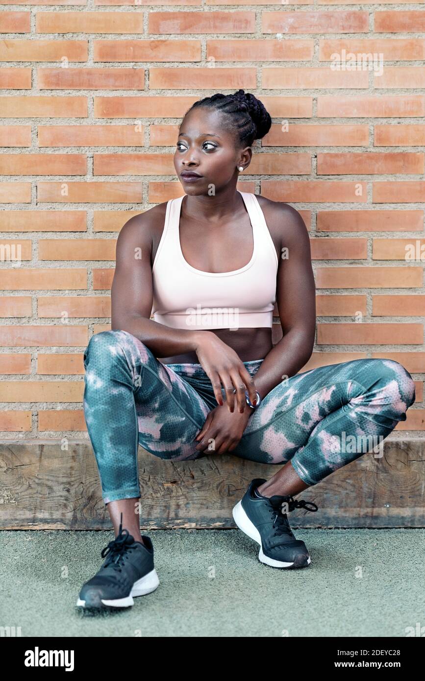 Stock photo of an African-American sprinter standing in front of a ...